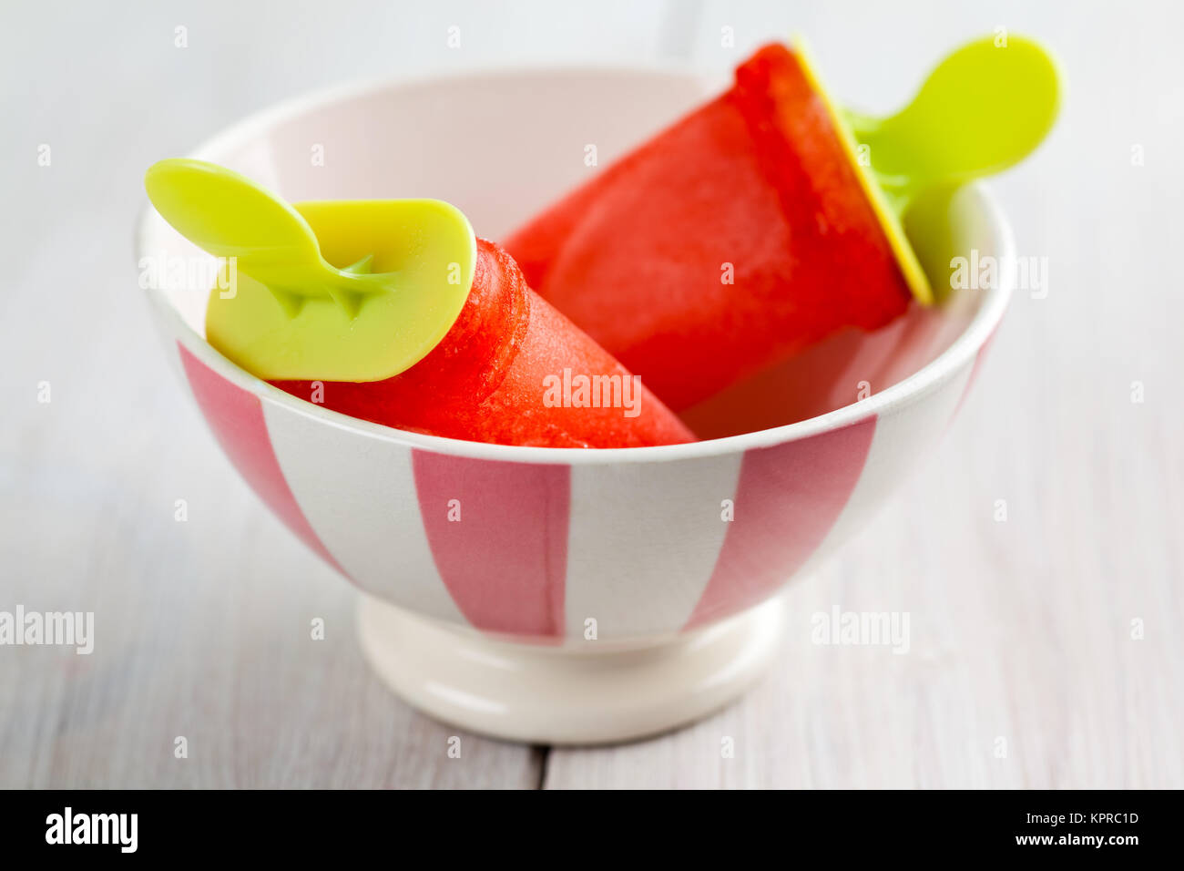 Ice pops in a bowl Stock Photo - Alamy