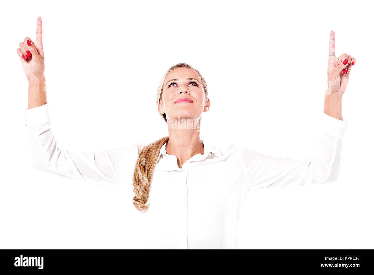 Woman looking and pointing upwards Stock Photo - Alamy