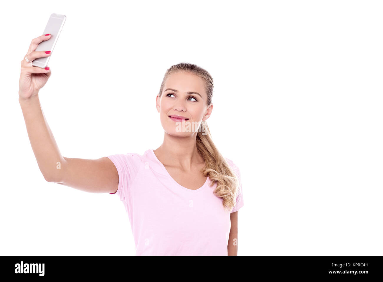 Casual pretty woman taking a selfie Stock Photo - Alamy