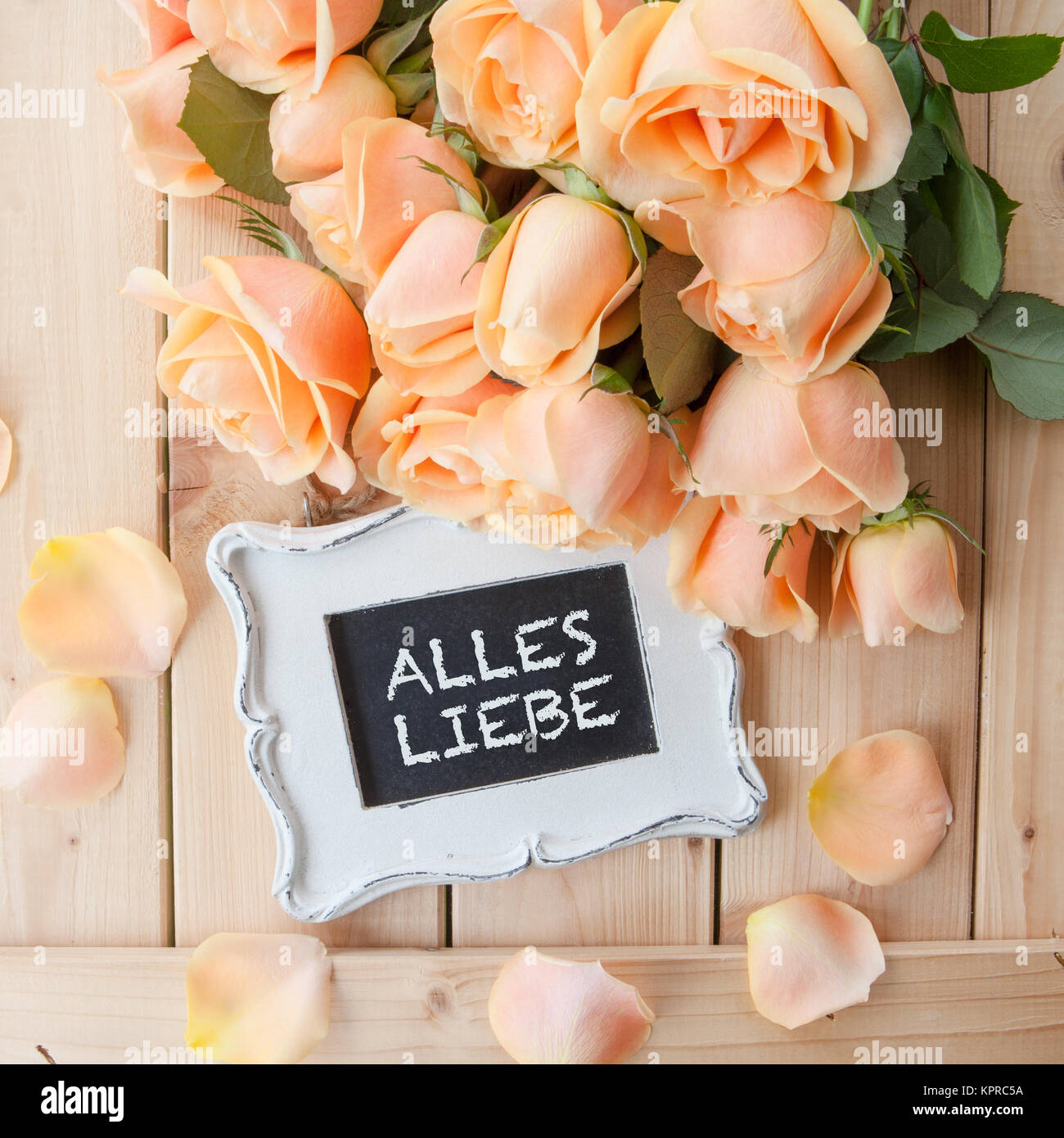 fresh roses and board Stock Photo - Alamy