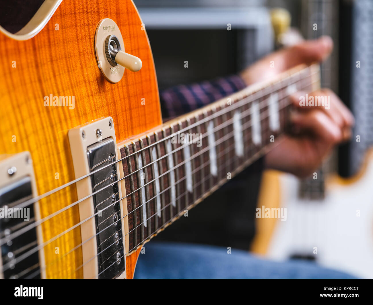 Closeup of playing the electric guitar Stock Photo - Alamy