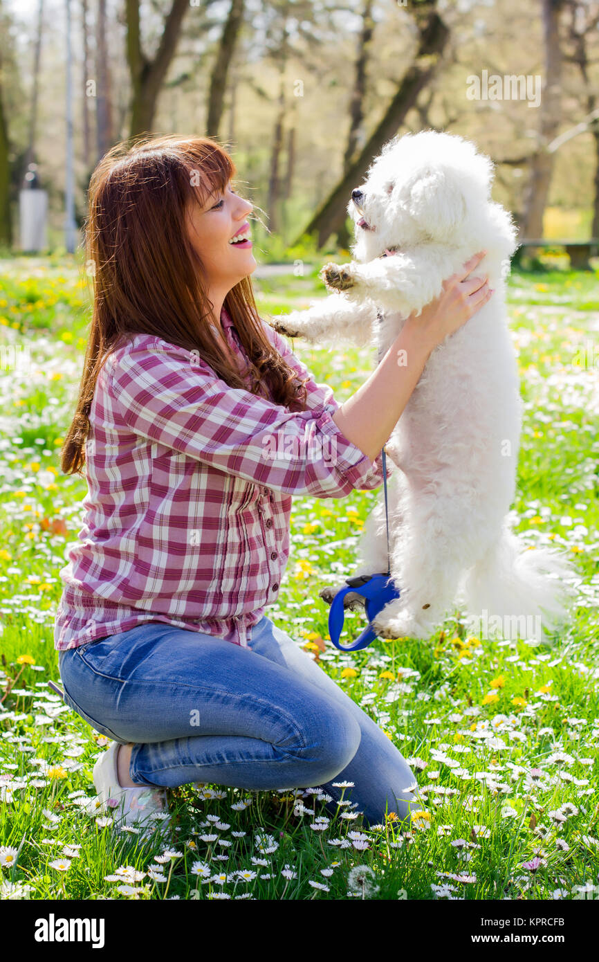 Happy Woman Enjoying Nature With Her Dog Stock Photo - Alamy