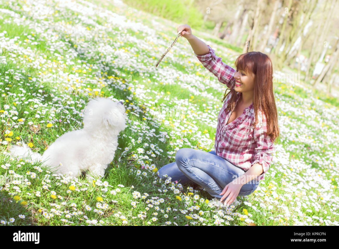 Happy Woman Enjoying Nature With Her Dog Stock Photo - Alamy