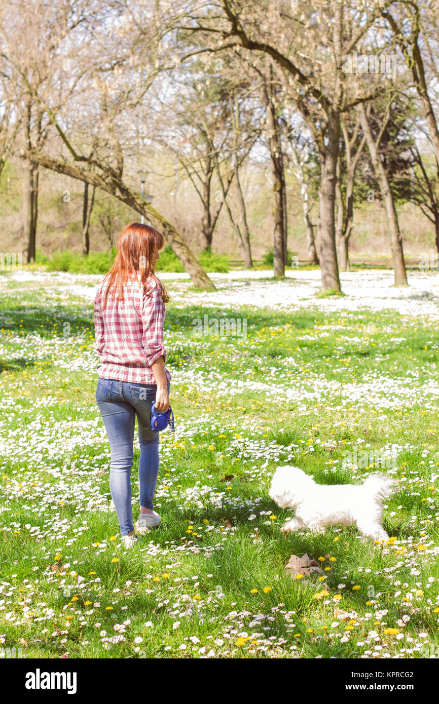 Happy Woman Enjoying Nature With Her Dog Stock Photo - Alamy