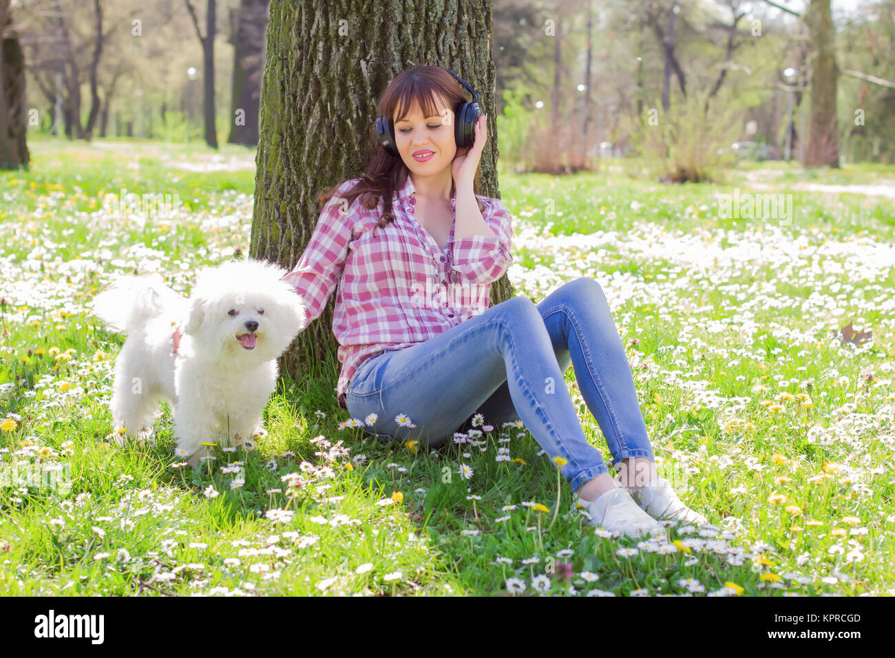 Happy Woman Enjoying Nature With Her Dog Stock Photo - Alamy