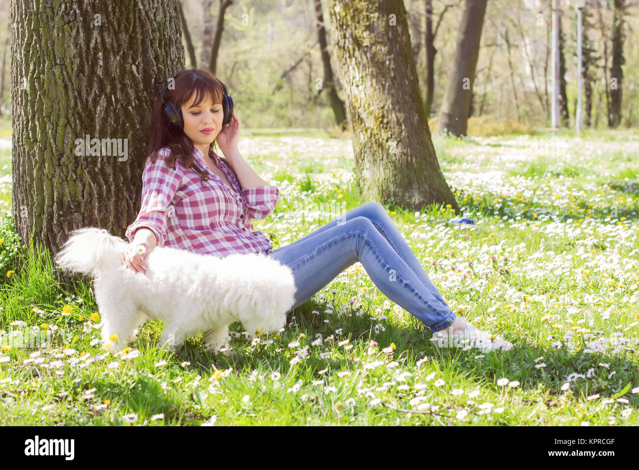 Happy Woman Enjoying Nature With Her Dog Stock Photo - Alamy