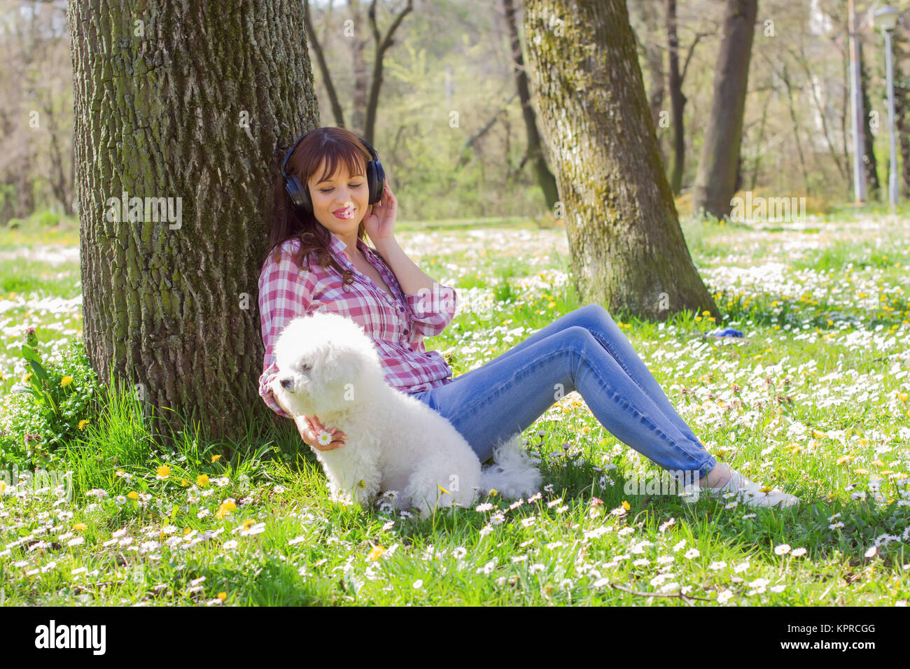 Happy Woman Enjoying Nature With Her Dog Stock Photo - Alamy