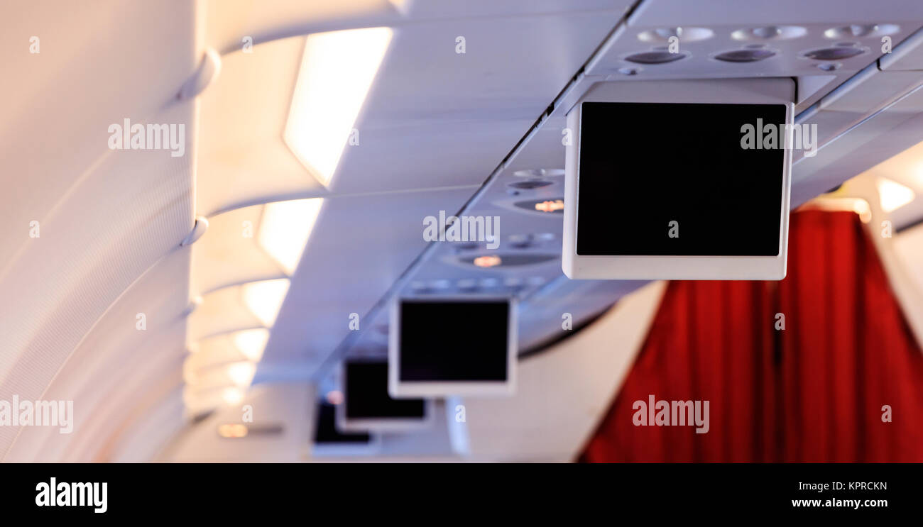 Aircraft's tv screens in a row. Copyspace and blank, black screen Stock ...