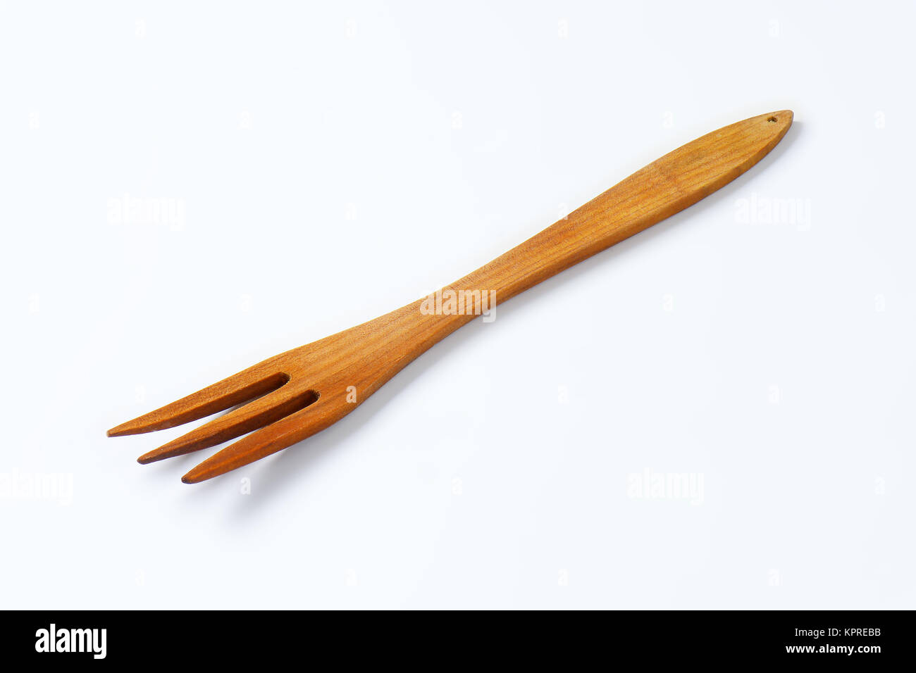 Three pronged wooden fork Stock Photo - Alamy
