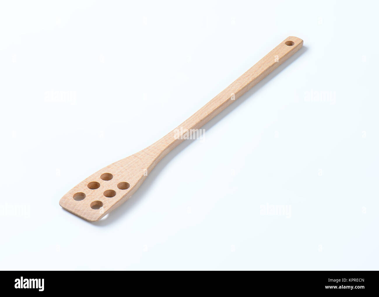 Spatula with holes Stock Photo - Alamy