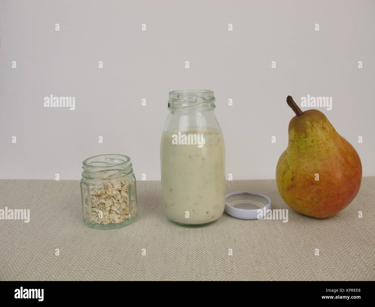 Muesli smoothie with pear Stock Photo - Alamy
