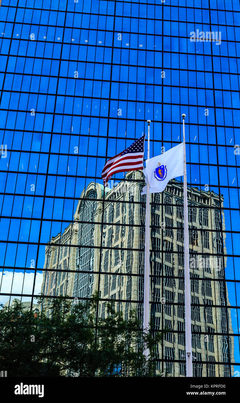 Building Reflected and Flags at Blue Glass Office Tower Stock Photo - Alamy
