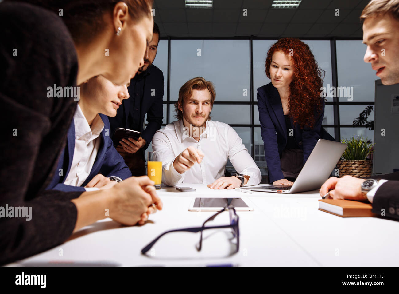 business team and manager in a meeting Stock Photo - Alamy