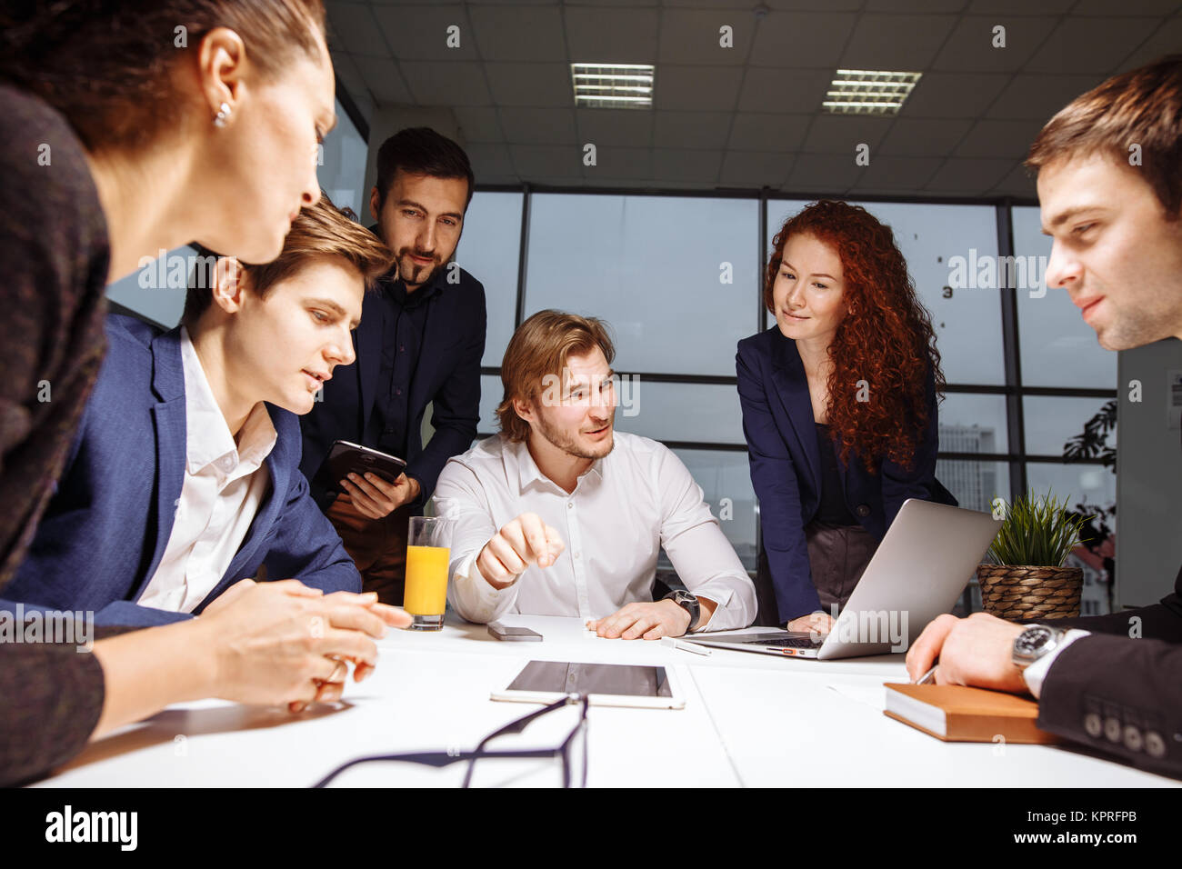 business team and manager in a meeting Stock Photo - Alamy