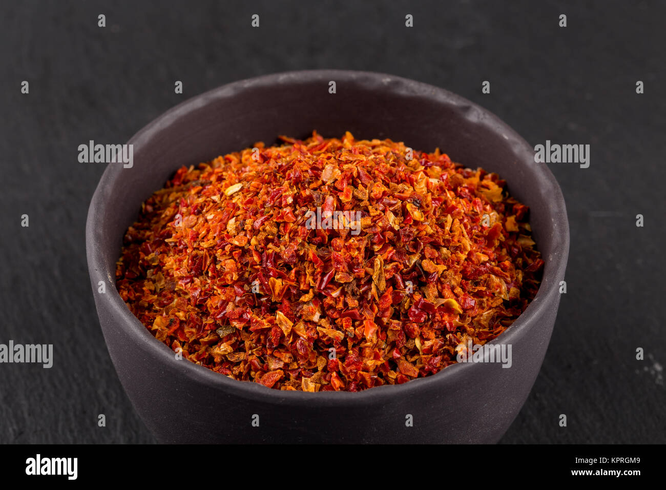 Crushed red chili pepper Stock Photo - Alamy