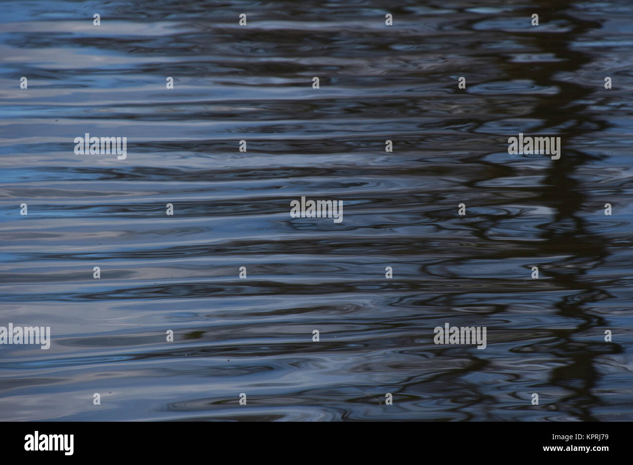 Blue water ripples surface texture Stock Photo - Alamy