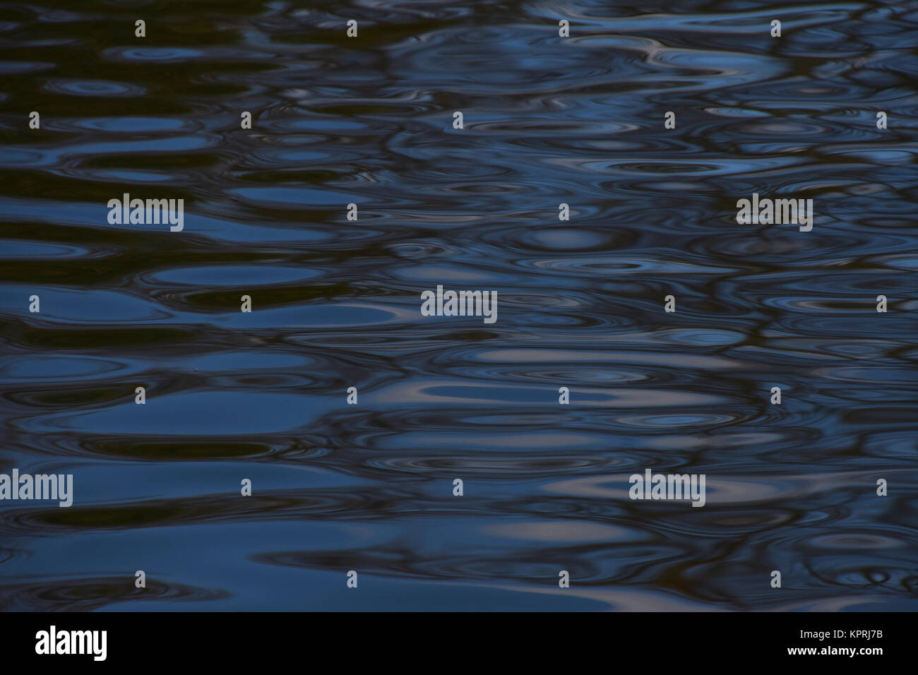 Blue water ripples surface texture Stock Photo - Alamy