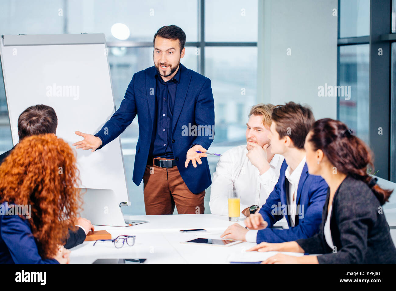 boss leader coaching in office. On job training. Business and Education ...