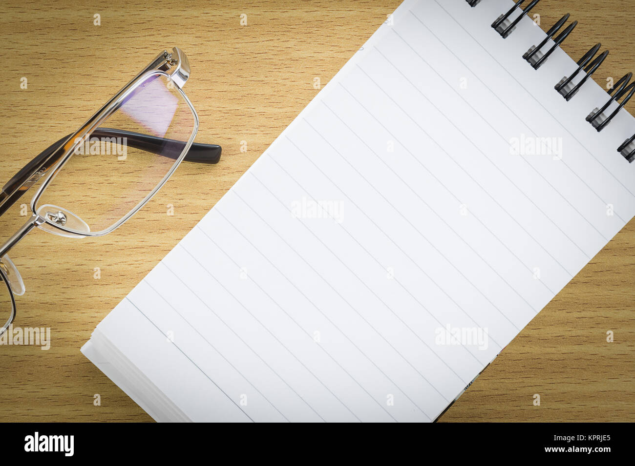 Notepad with blank page Stock Photo - Alamy