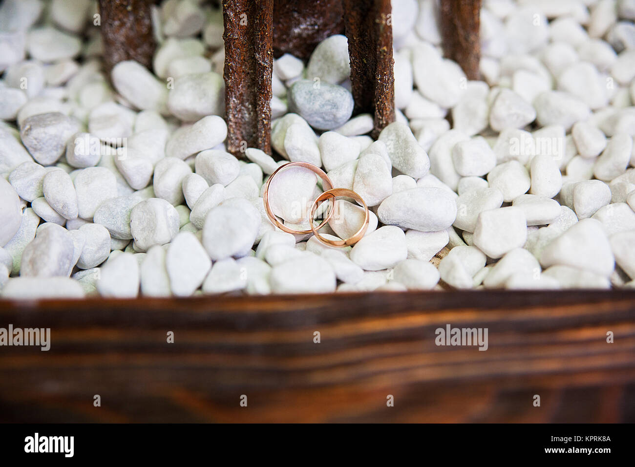 wedding ring on the stone Stock Photo - Alamy