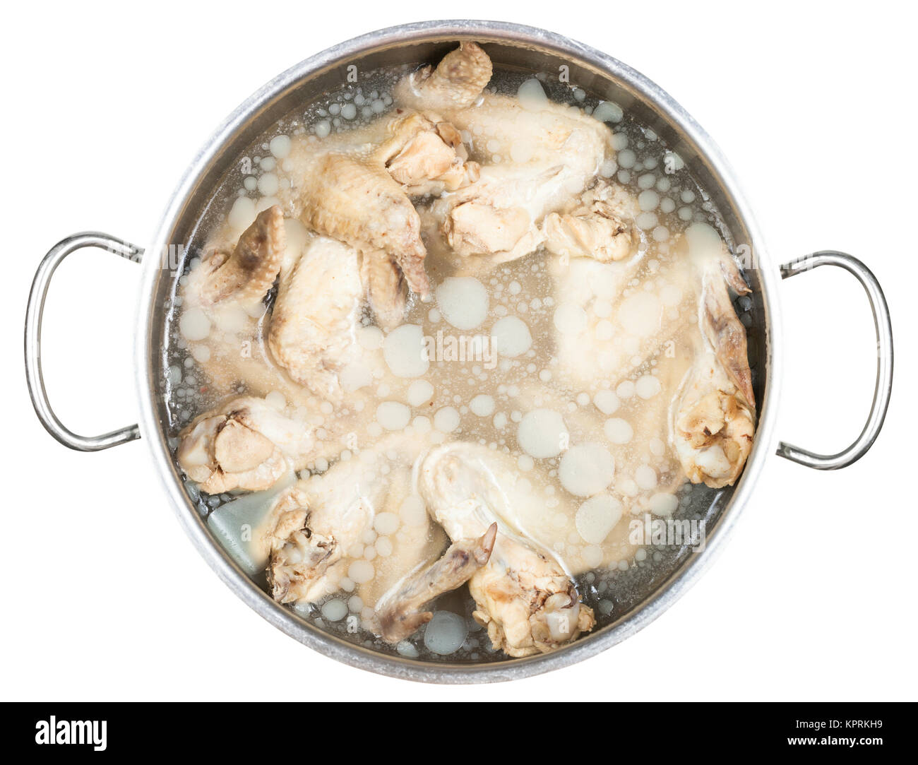 stewpan with cold boiled chicken wings in broth Stock Photo - Alamy