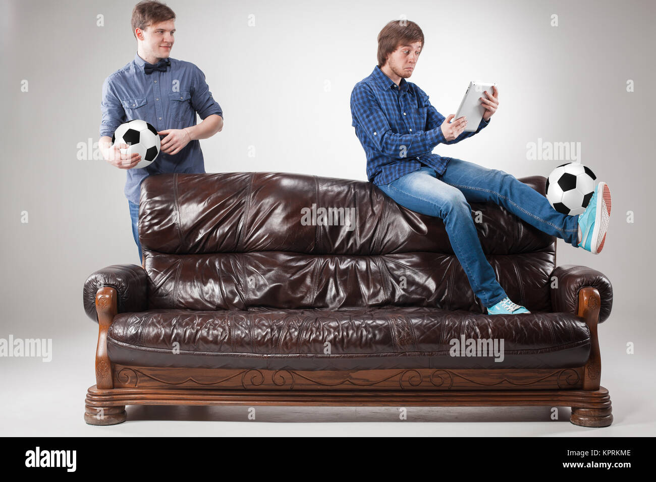 Two guys playing football hi-res stock photography and images - Alamy