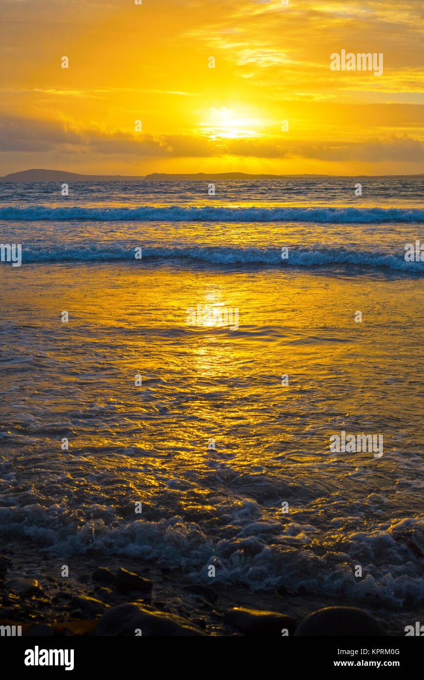 yellow sunset at beal beach Stock Photo - Alamy