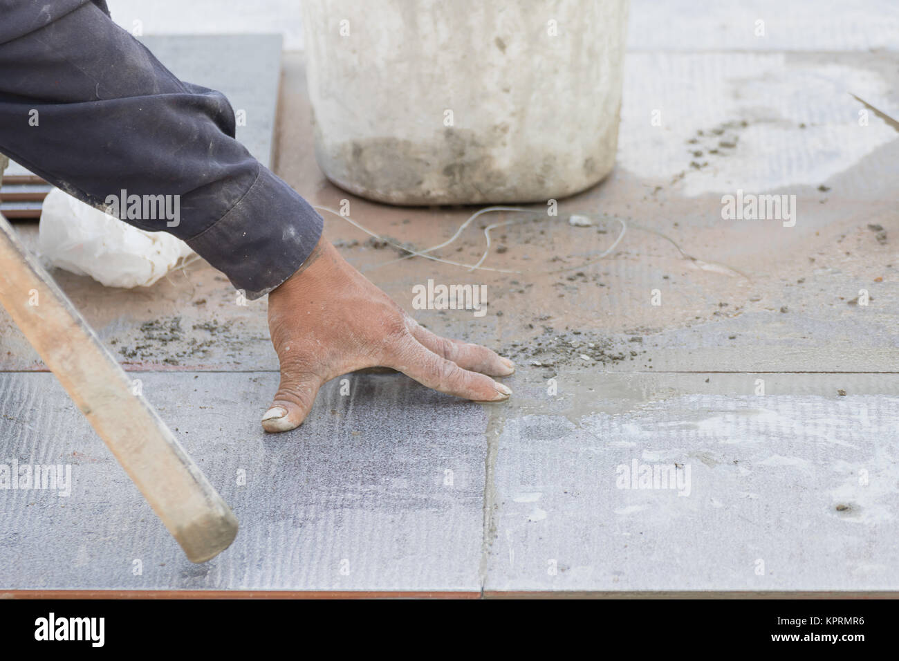 Mason tiling on floor Stock Photo - Alamy