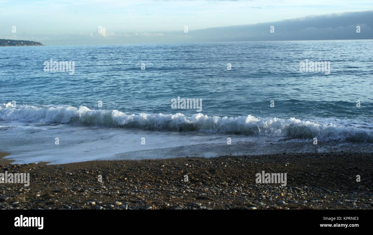 Sea and beach in Nice Stock Photo - Alamy