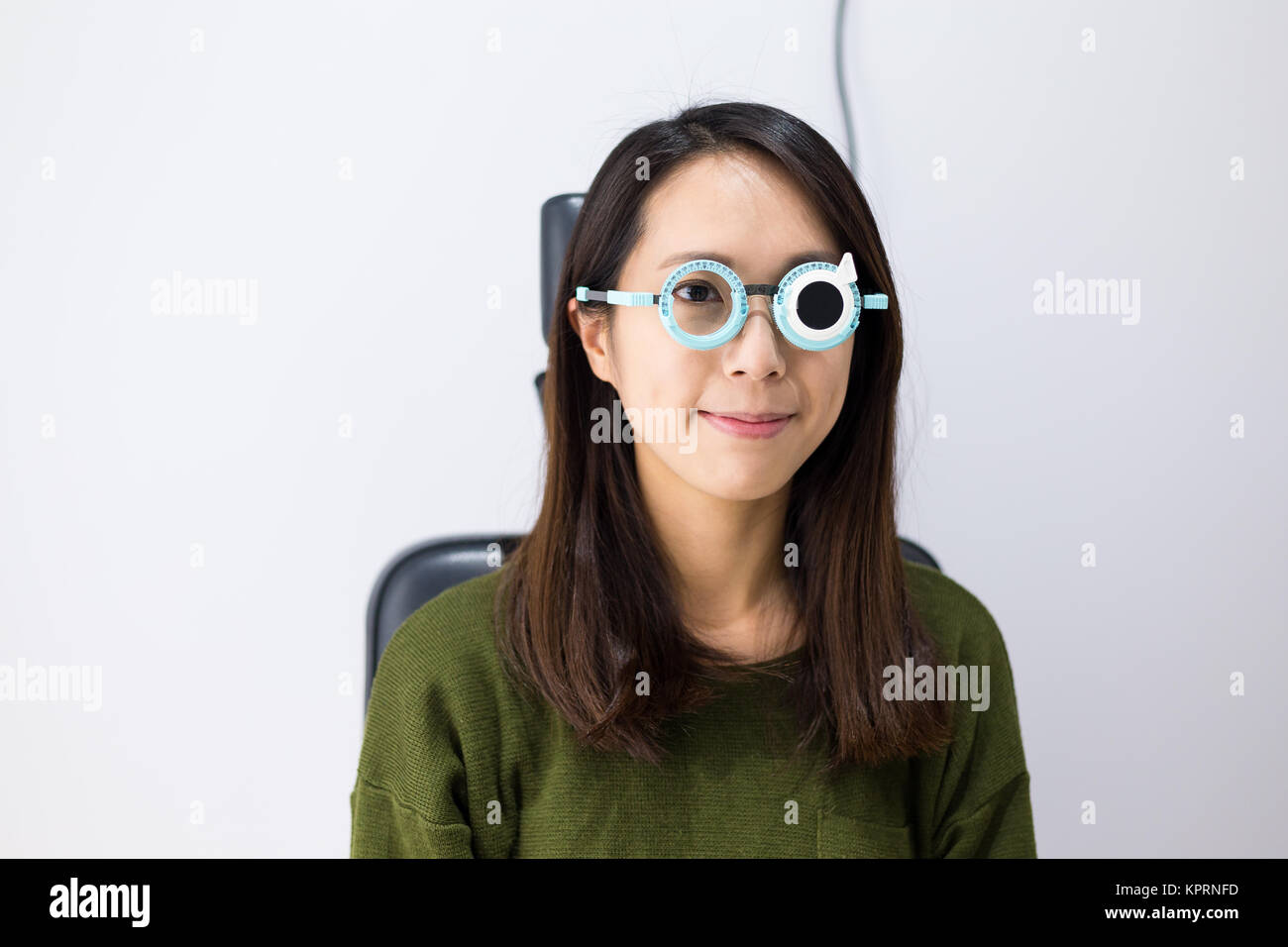 Woman getting eye exam Stock Photo - Alamy