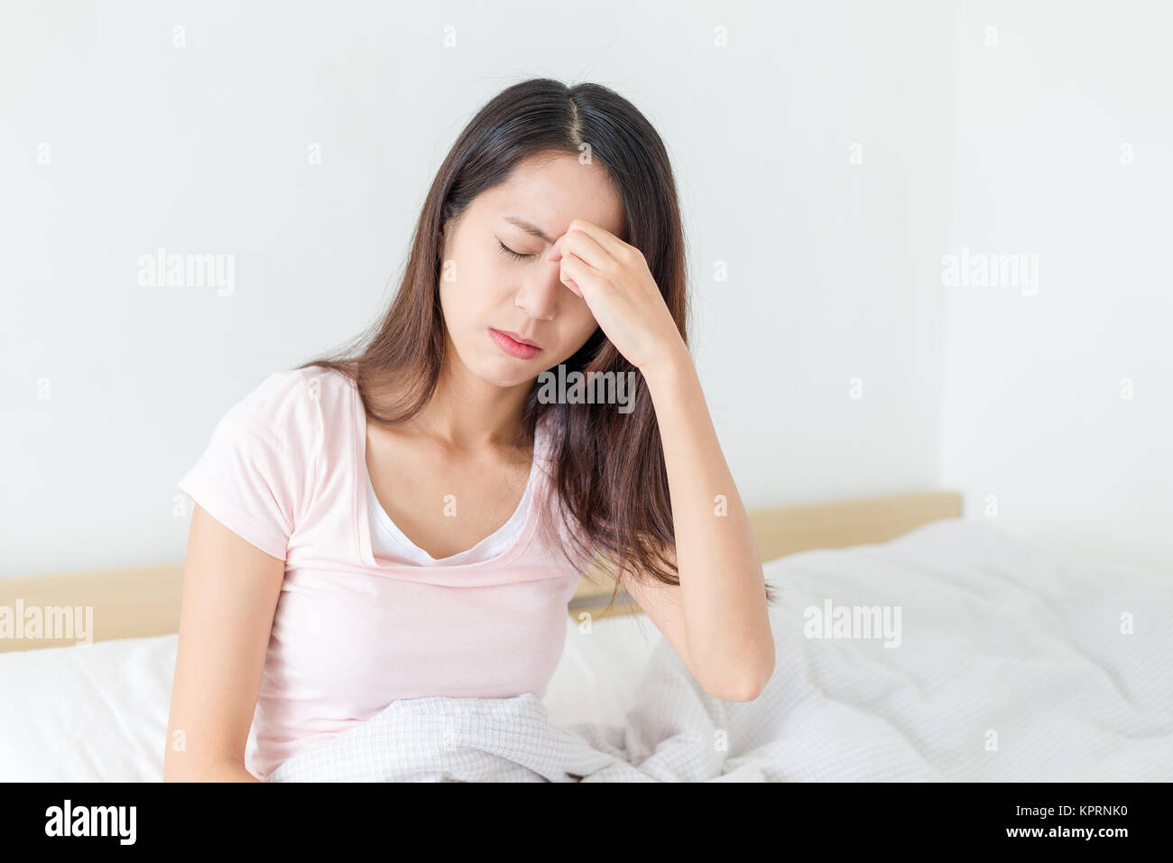 Woman pillow feeling fatigue home hi-res stock photography and images ...