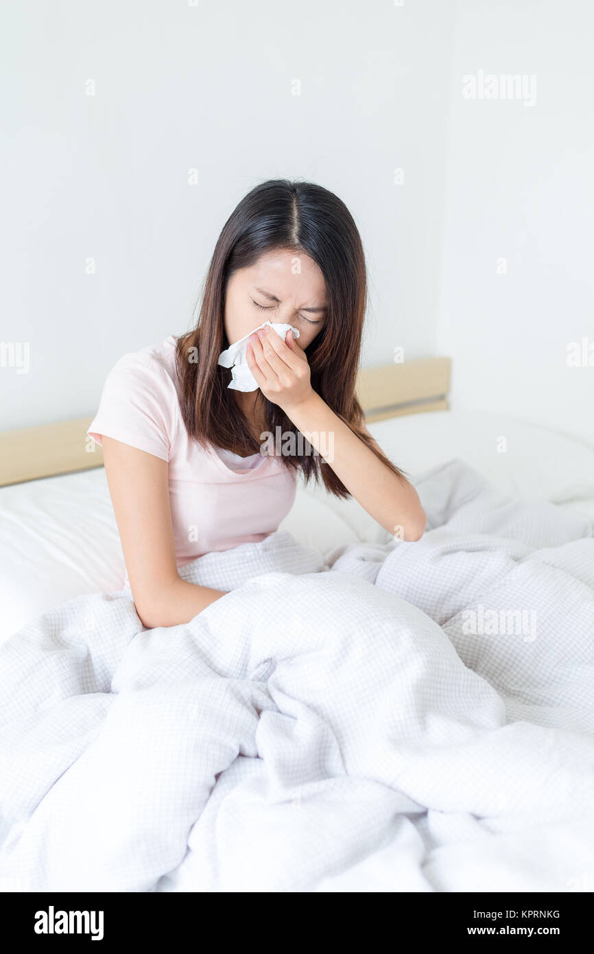 Woman feeling unwell Stock Photo - Alamy