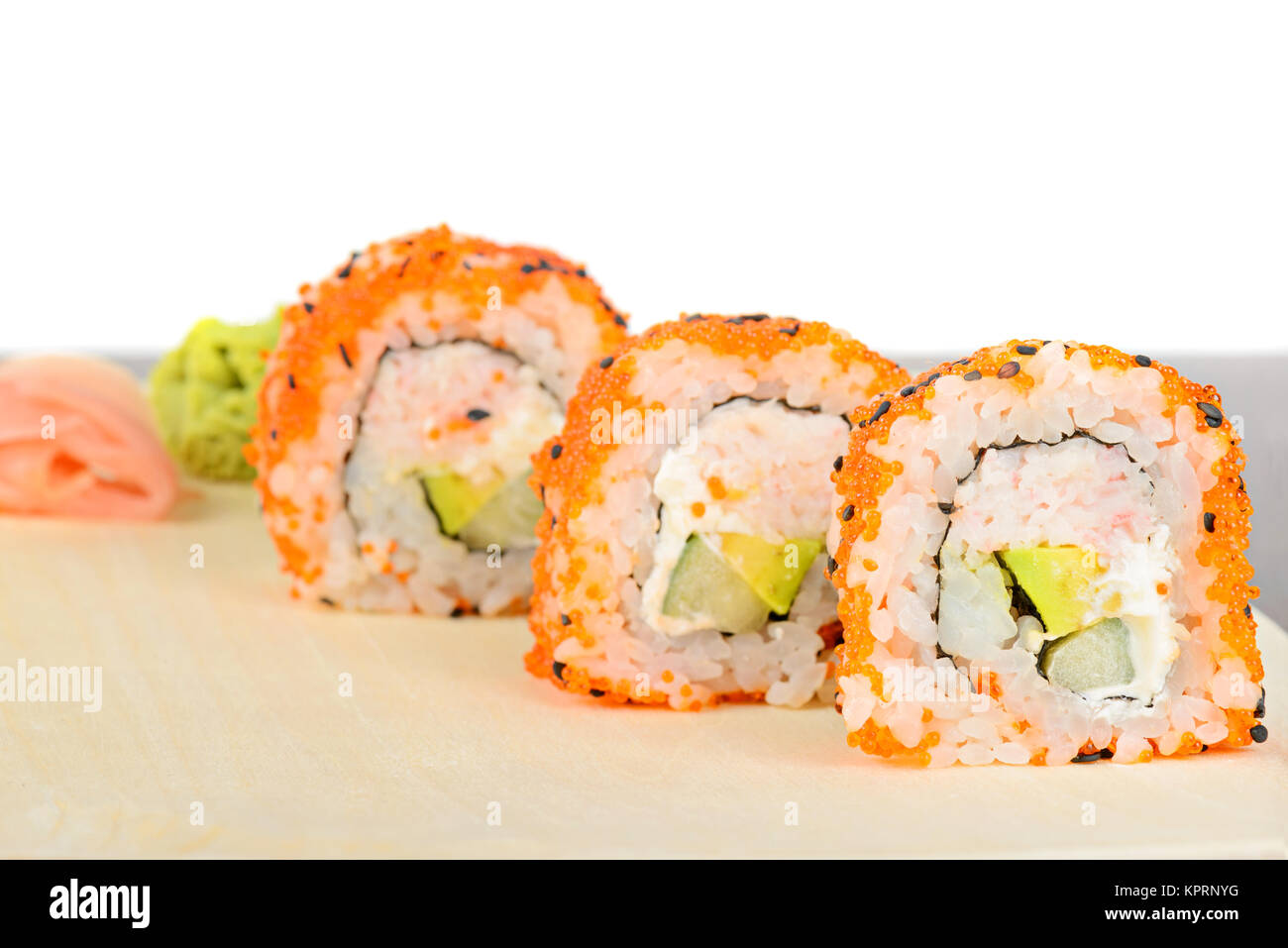 Closeup California maki sushi in row Stock Photo - Alamy