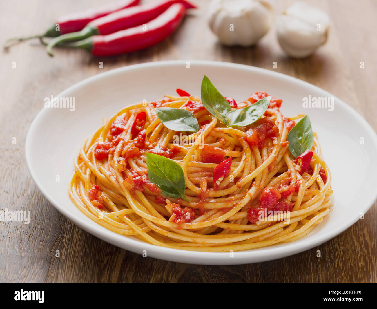 rustic italian spaghetti arrabbiata pasta Stock Photo - Alamy