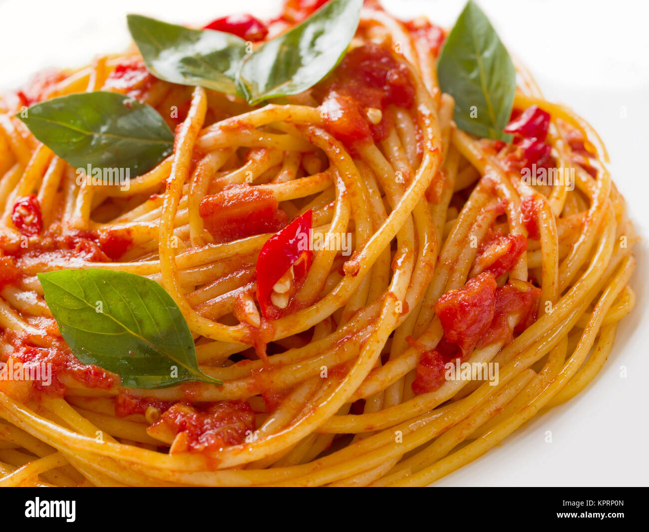rustic italian spaghetti arrabbiata pasta Stock Photo - Alamy