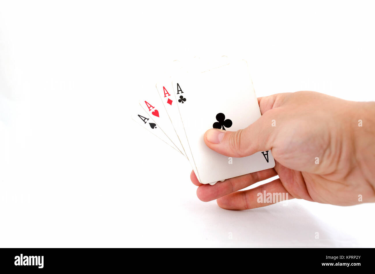 Playing cards in hand Stock Photo - Alamy
