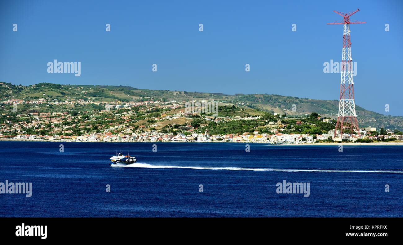 Hydrofoil boats and the Torre Faro electricity Pylon of Messina taken ...