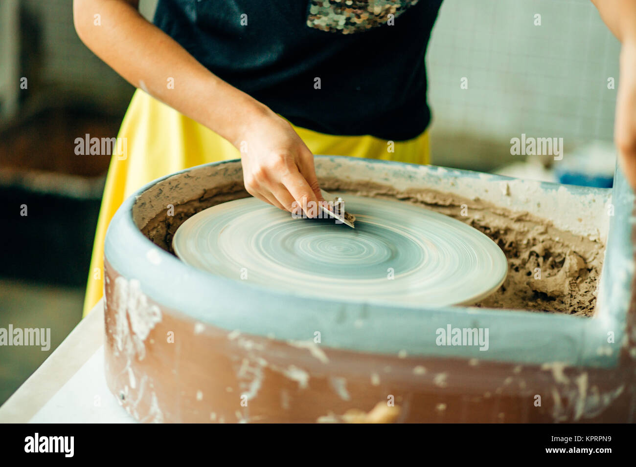 Hands of young potter, close up hands made cup on pottery wheel Stock ...