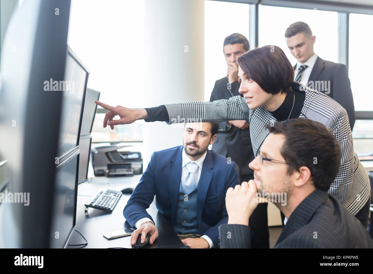 Business team working in corporate office Stock Photo - Alamy
