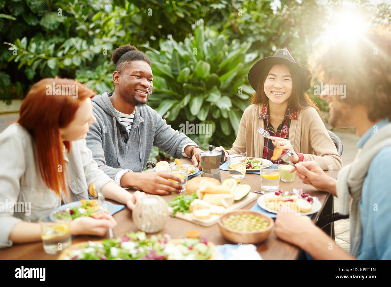 Gathering by dinner Stock Photo - Alamy