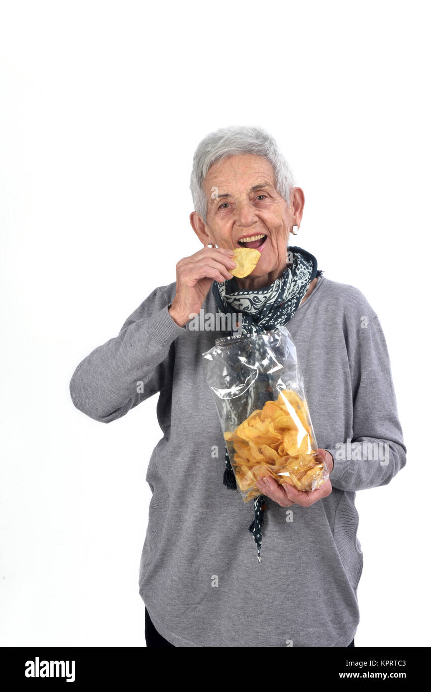 Attractive woman eating chips hi-res stock photography and images - Alamy