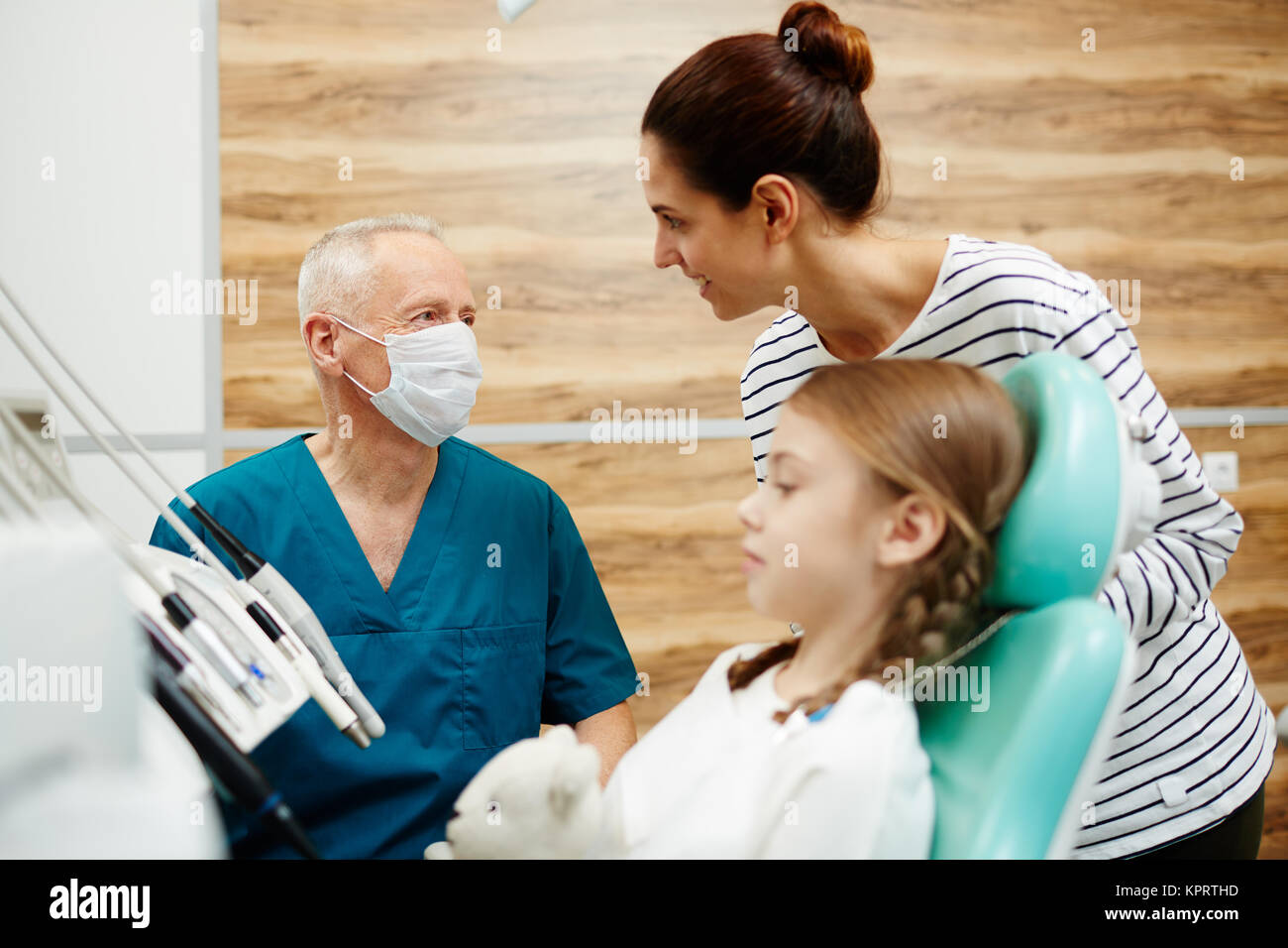 Consulting with dentist Stock Photo - Alamy