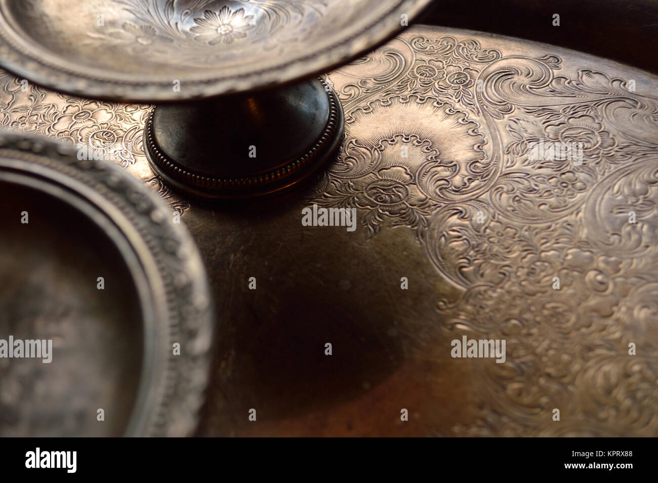 Tarnished silver dishes Stock Photo - Alamy
