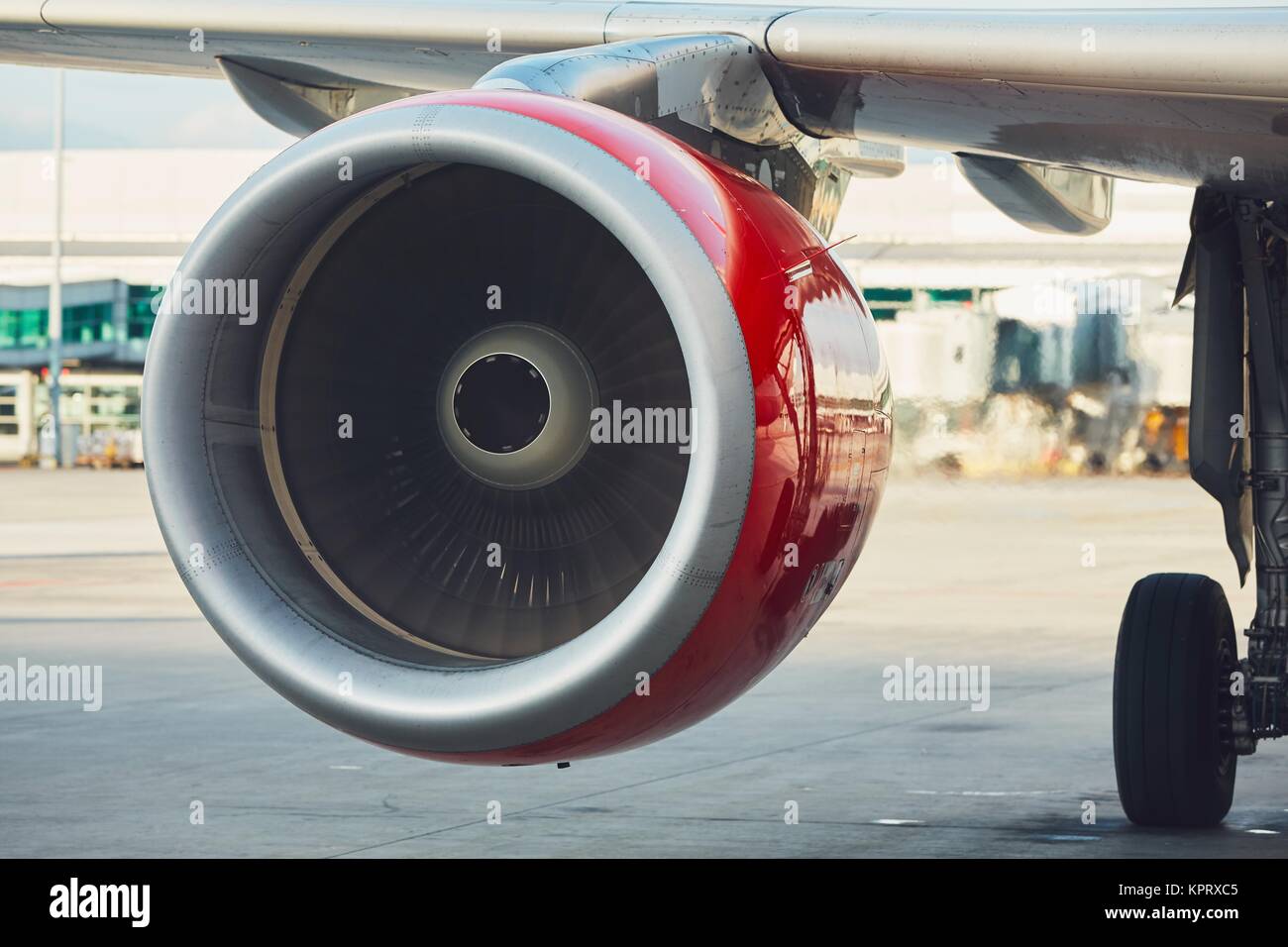 Traffic at the airport. Engine of the airplane on the runway Stock ...