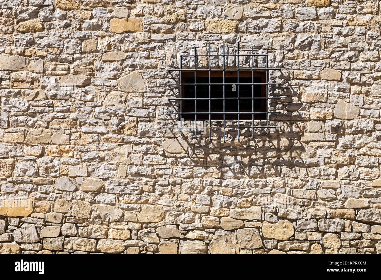 Assisi (Italy): Window on medieval stone wall Stock Photo - Alamy