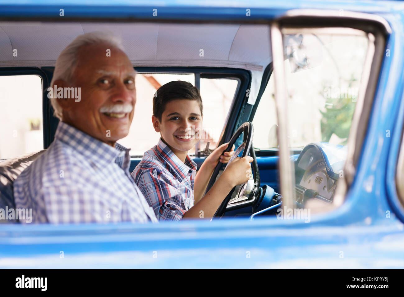 Portrait Grandpa Giving Driving Lesson To Boy In Old Car Stock Photo ...