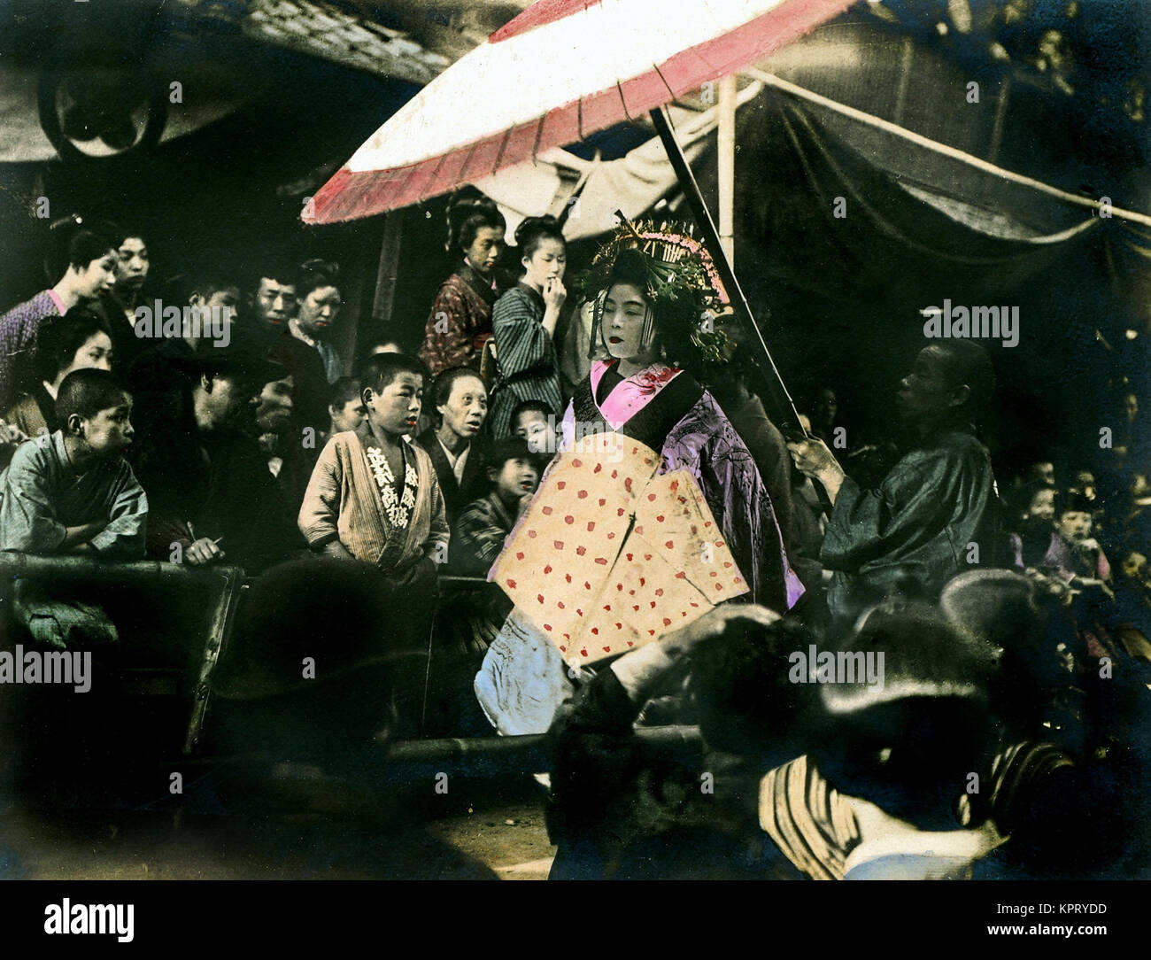Geisha on Parade under an Umbrella Stock Photo - Alamy