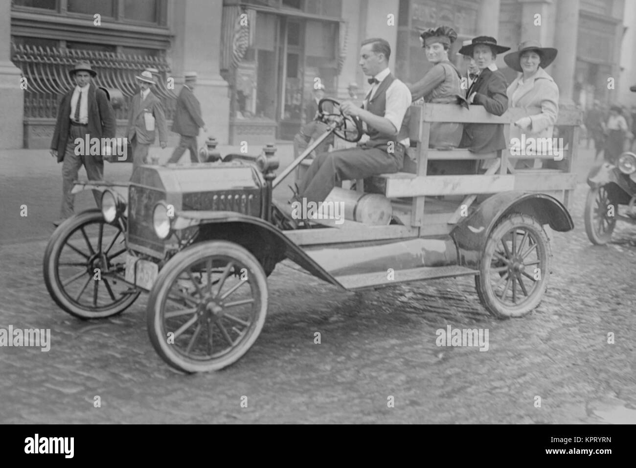 New York Car Strike has women transported to work in an open sided male ...