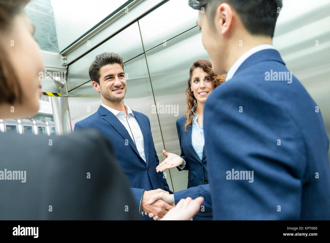 Group of business team shaking hand Stock Photo - Alamy