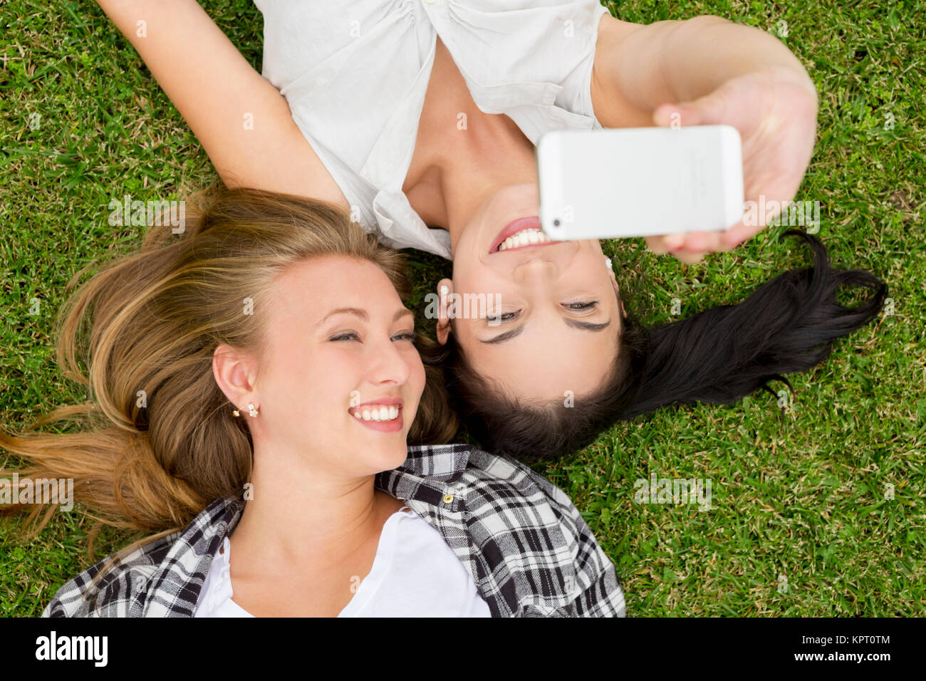 Best friends taking selfies Stock Photo - Alamy